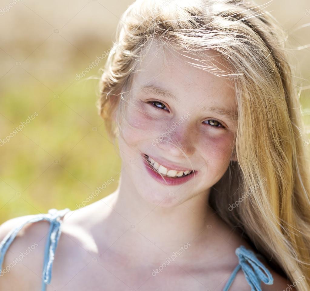 Portrait of a beautiful young little girl — Stock Photo © arkusha #122552322