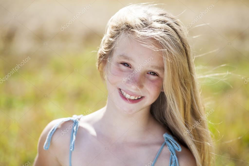 Portrait of a beautiful young little girl — Stock Photo © arkusha #122552352