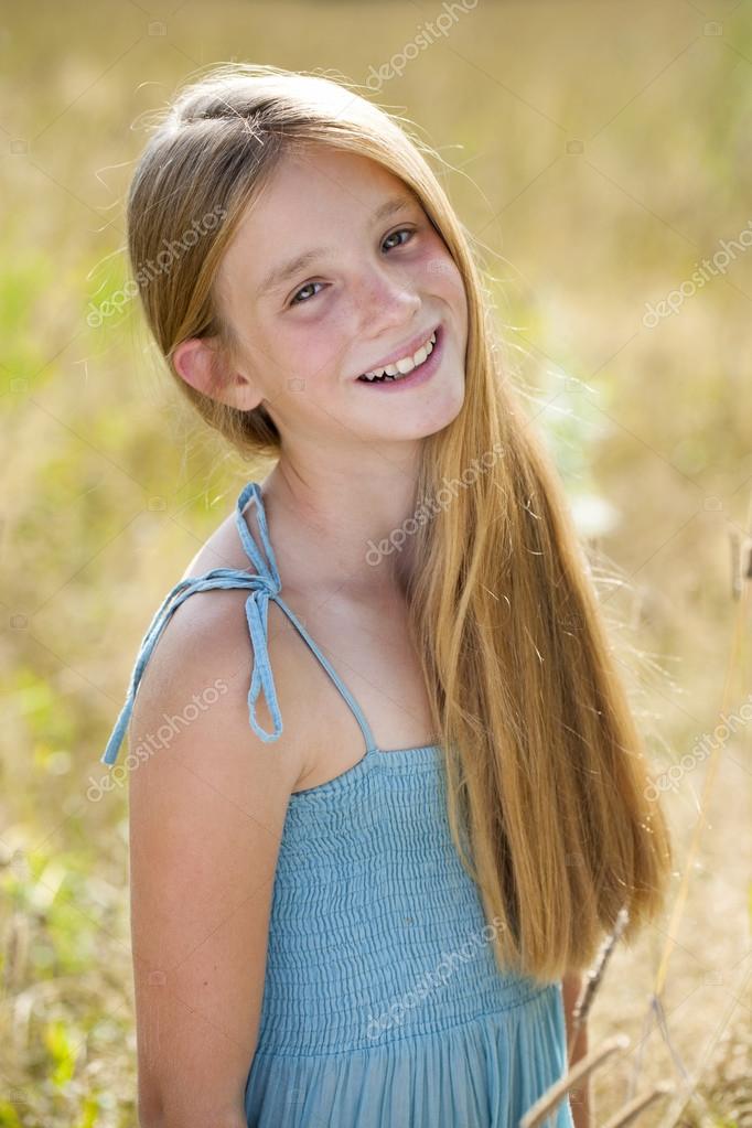 Portrait of a beautiful young blonde little girl — Stock Photo © arkusha #122859506