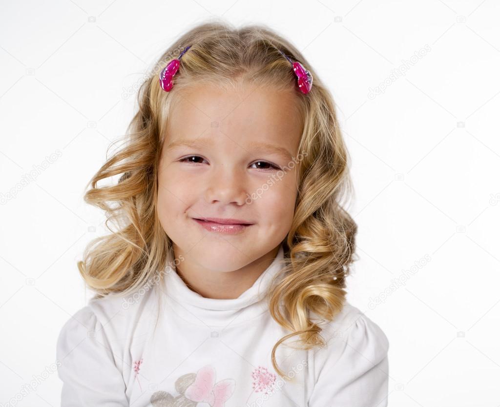 Portrait of a pretty liitle girl Stock Photo by ©arkusha 57088495