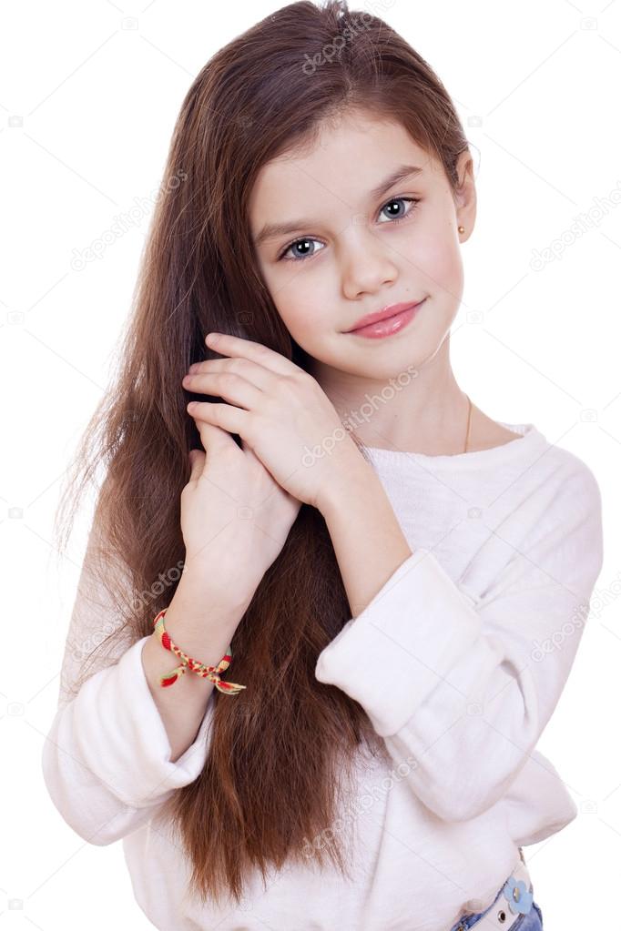 Portrait of a charming little girl smiling at camera Stock Photo by ... Portrait of a charming little girl smiling at camera Stock Photo by ...