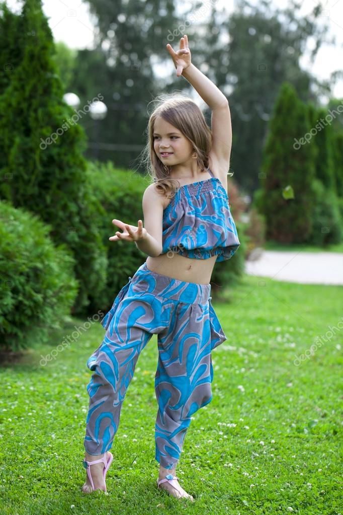 Portrait of a pretty liitle girl ⬇ Stock Photo, Image by © arkusha ...