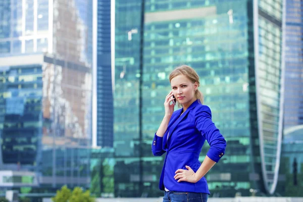 Beautiful young blonde calling by phone – Stock Editorial Photo ...