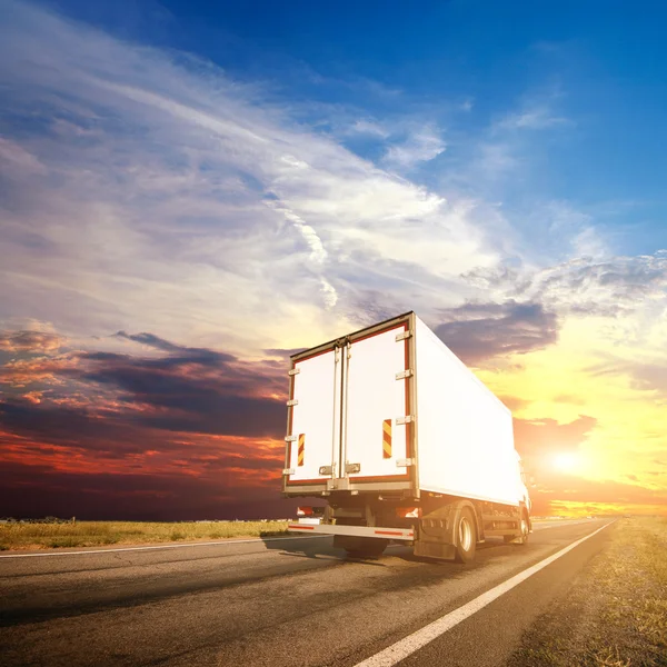 truck with freight moving fast - Stock Image - Everypixel