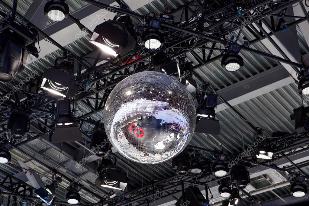Party lights disco ball at a nightclub — Stock Photo © gilmanshin #77633970