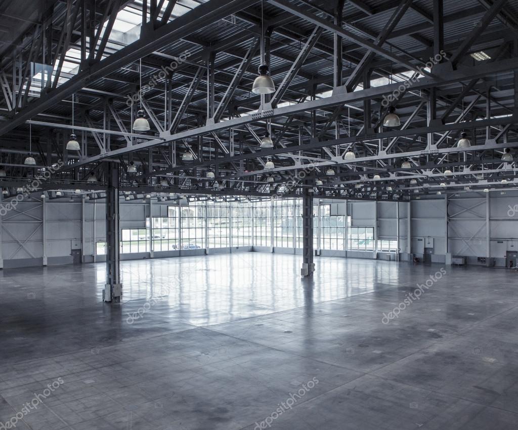 Interior of an empty warehouse — Stock Photo © gilmanshin #81047880