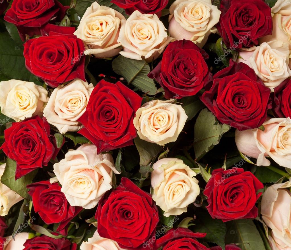 Big red and yellow roses bouquet background, top view Stock Photo by ...