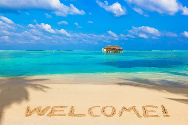 Word Welcome on beach Stock Photo by ©Violin 4307402