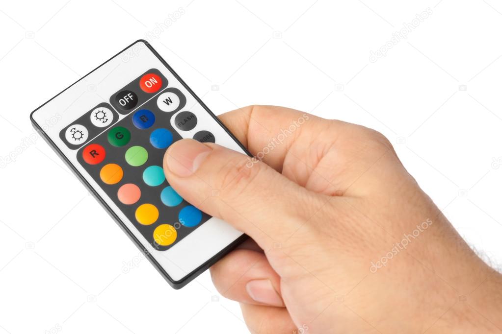 Remote control for change colors in hand Stock Photo by ©Violin 74801267