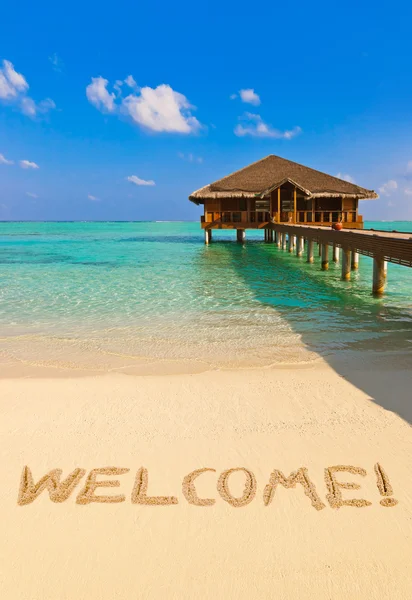 Word Welcome on beach Stock Photo by ©Violin 4307402