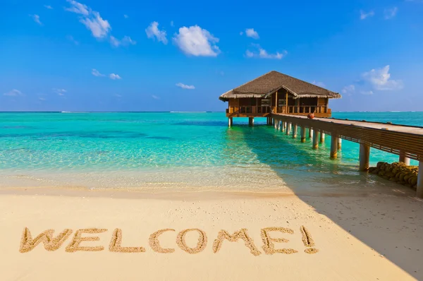 Word Welcome on beach Stock Photo by ©Violin 4307402