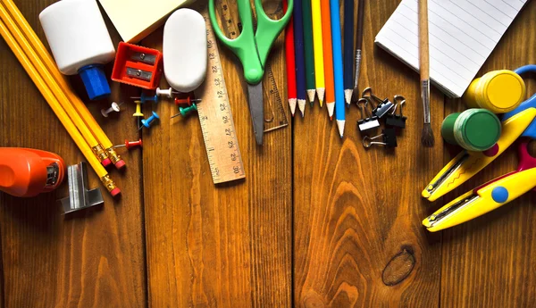 School equipment on wooden desk Stock Photo by ©Olegkalina 98310636