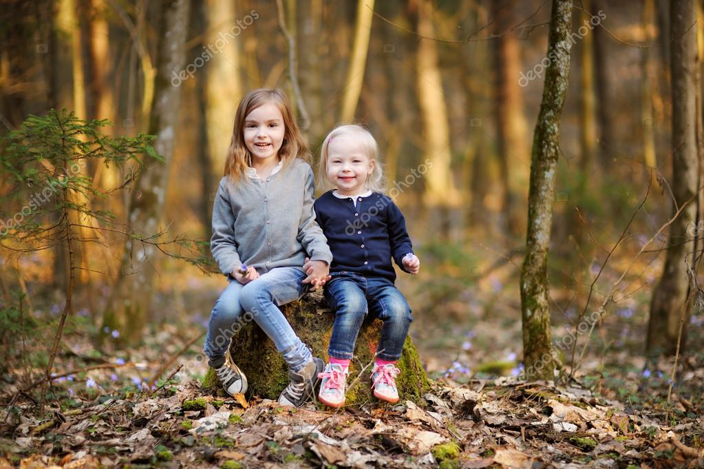 Little sisters in forest Stock Photo by ©MNStudio 60260487