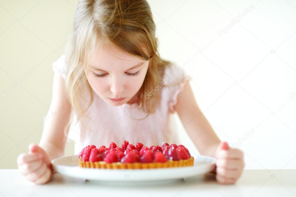 Little girl and raspberry cake Stock Photo by ©MNStudio 65774853