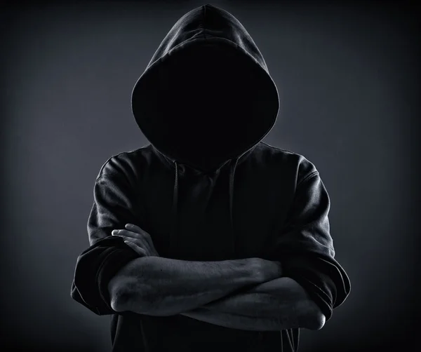 Faceless scary man in a hood. — Stock Photo © papa42 #102580928