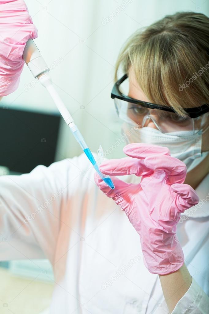 Researcher in modern laboratory — Stock Photo © kovalvs #58363987