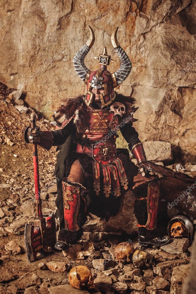 Powerful knight in heavy armor with the axe Stock Photo by ©bigdan ...