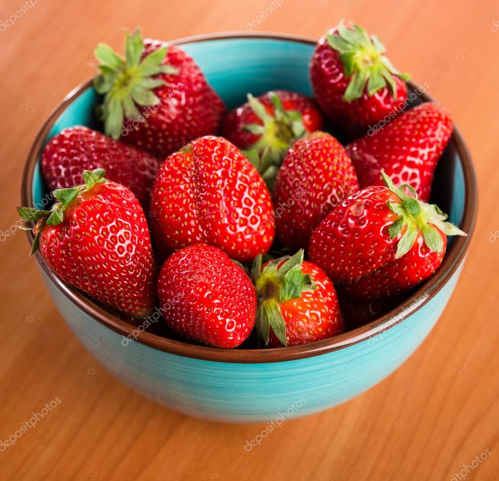 Ripe Strawberries in Bowl — Stock Photo © valphoto #62142673