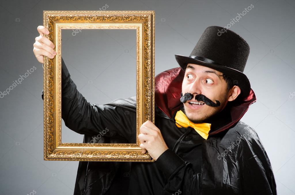 Funny man with picture frame Stock Photo by ©Elnur_ 110020350
