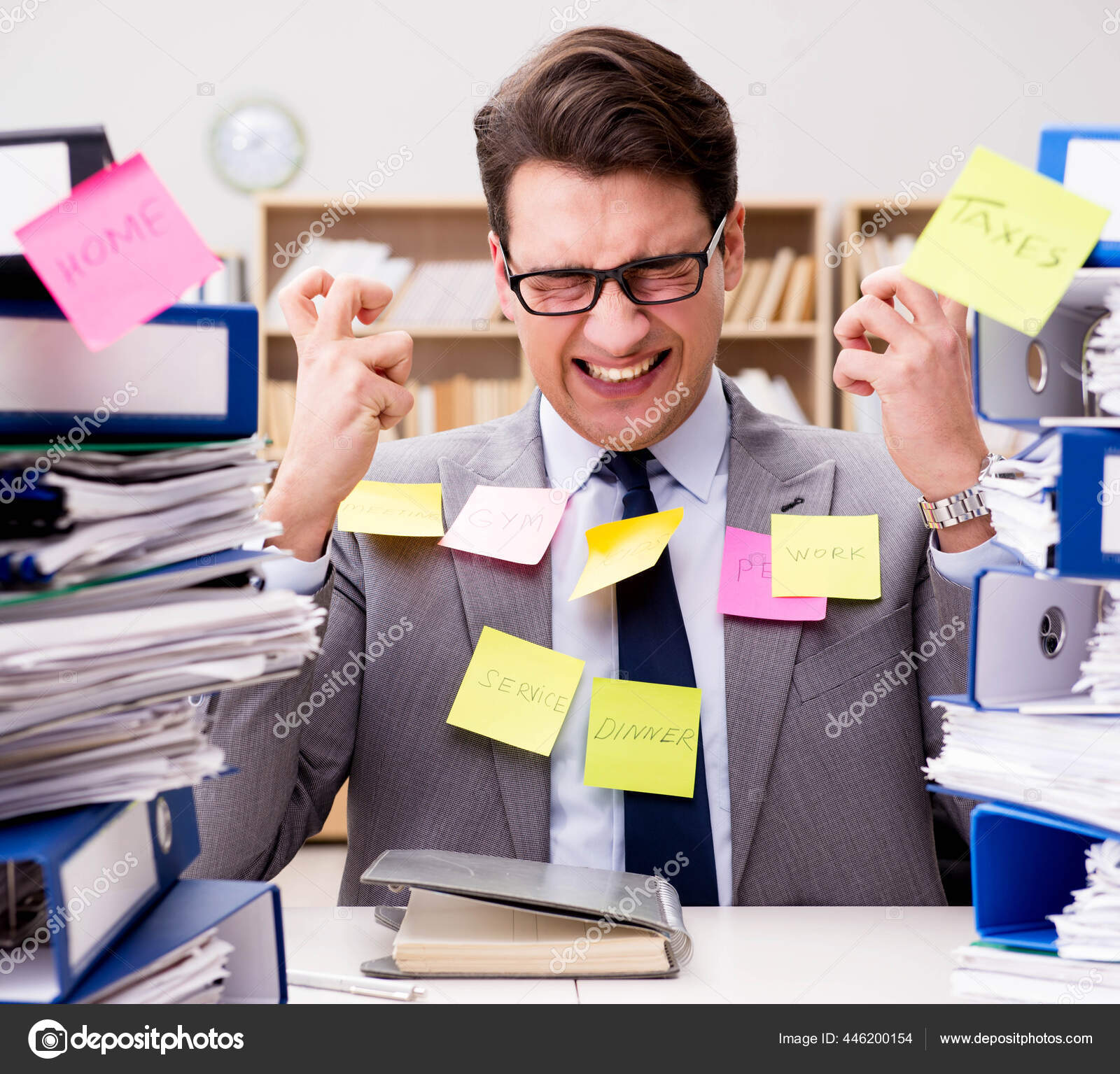 Businessman struggling with multiple priorities — Stock Photo © Elnur ...