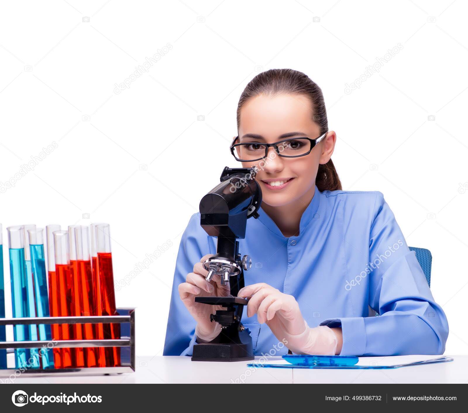 Lab chemist working with microscope and tubes — Stock Photo © Elnur ...