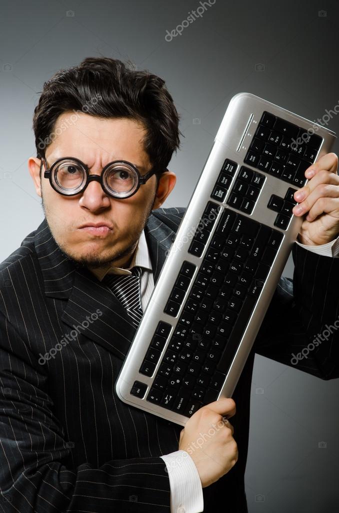Comouter geek with computer keyboard — Stock Photo © Elnur_ #53421603