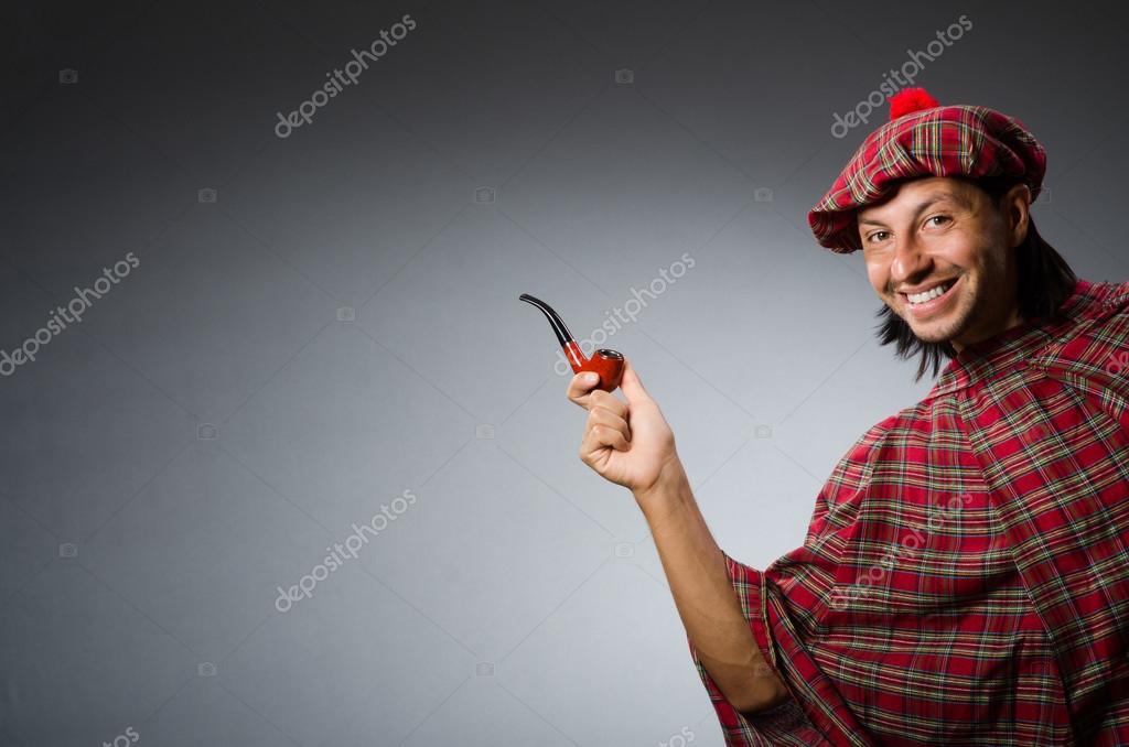 Funny scotsman with smoking pipe Stock Photo by ©Elnur_ 53851079