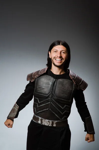 Angry warrior against dark background Stock Photo by ©Elnur_ 57369047