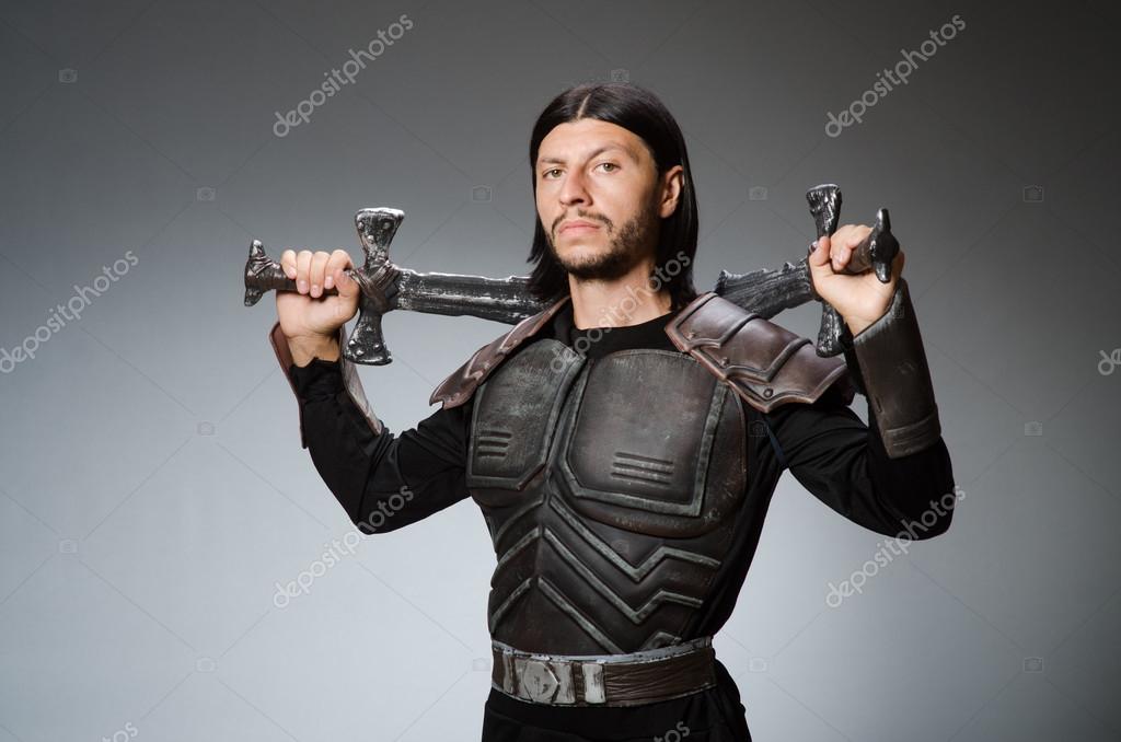 Angry knight with sword Stock Photo by ©Elnur_ 59161895