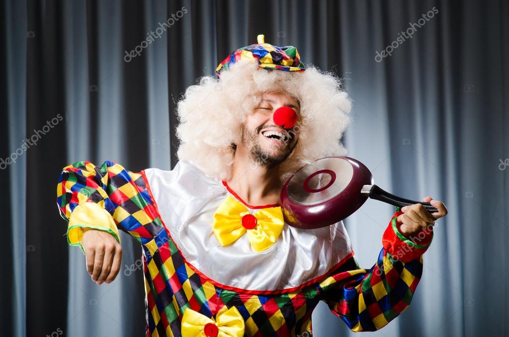 Clown with frying pan — Stock Photo © Elnur_ #67128777