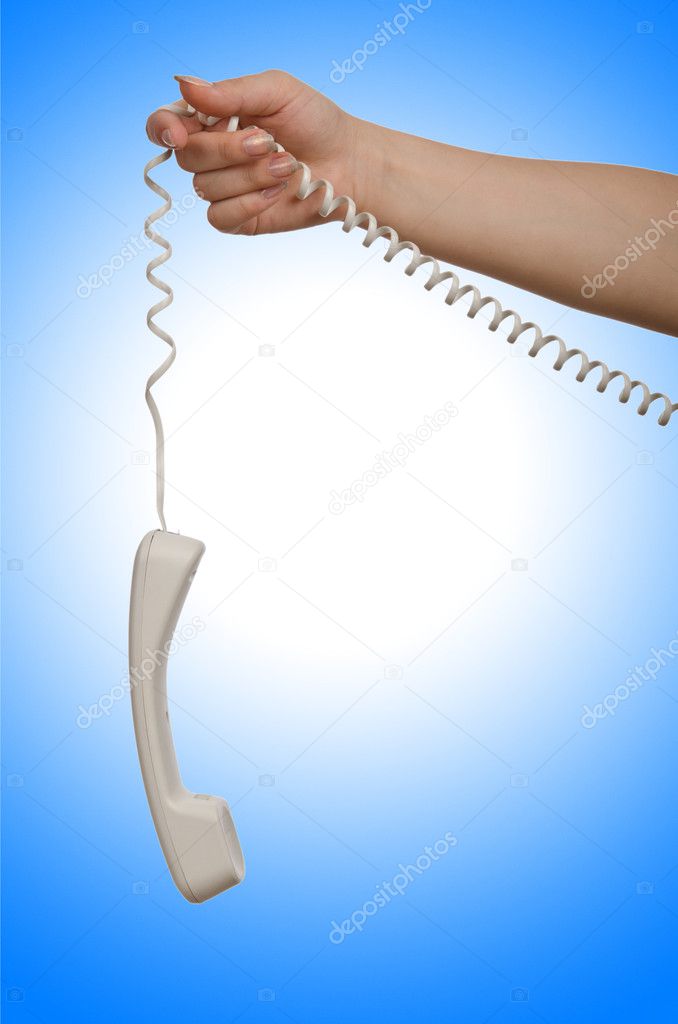 Hand with hanging landline phone — Stock Photo © Elnur_ #68002689