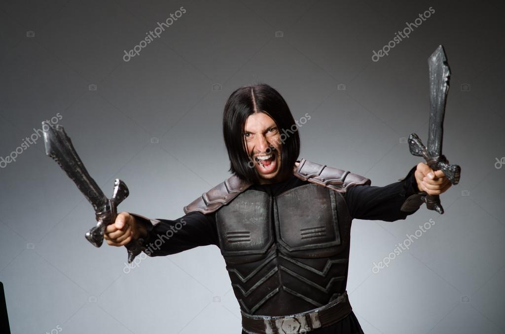 Angry knight with swords Stock Photo by ©Elnur_ 68025253