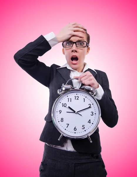 Funny woman with clock against the gradient - Stock Image - Everypixel