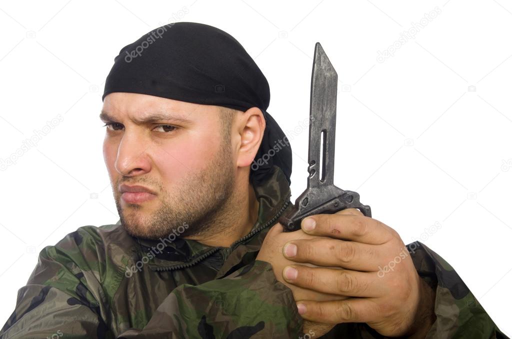 Young man in soldier uniform holding knife isolated on white — Stock ...