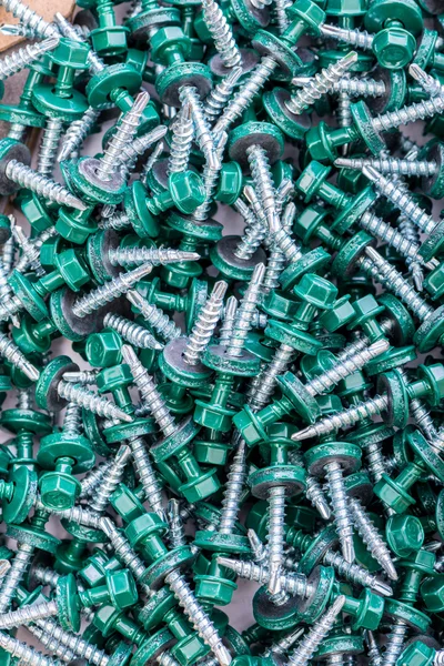 Many screws arranged as background Stock Photo by ©Elnur_ 83050318