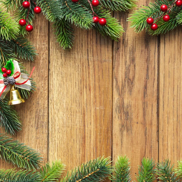 Decorated Christmas tree border on wood paneling - Stock Image - Everypixel