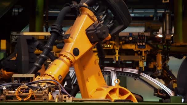 Robot assembly line in car factory Stock Photo by ©phonlamai 165502472