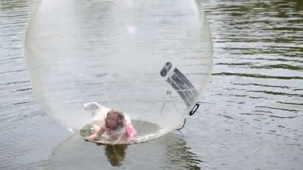 Little girl inside inflatable ball — Stock Video © Paha_L #74552335