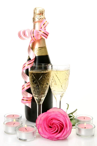 Pink roses and champagne — Stock Photo © Elena777 #54717367