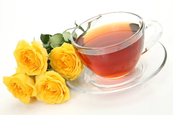 Tea cup and roses Stock Photo by ©Elena777 61605907
