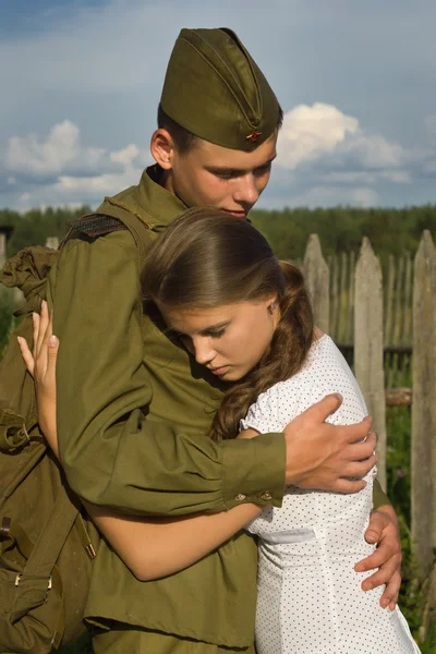 Soviet soldier saying goodbye to girl — Stock Photo © Demian #84652560
