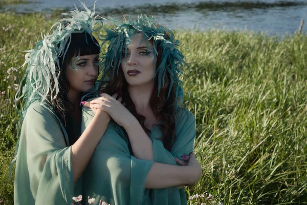 Two mermaids on the lake Stock Photo by ©Demian 87190194