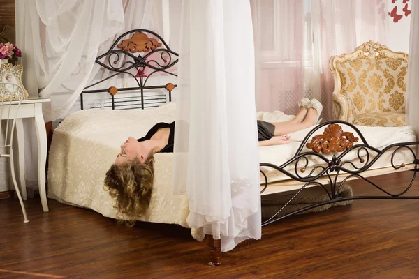 Dead woman lying on the bed Stock Photo by ©Demian 83668604