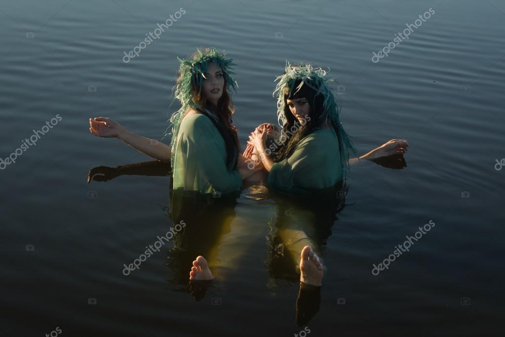 Love between men and two beautiful mermaids — Stock Photo © Demian ...