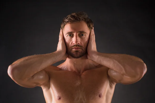 Serious shirtless mascular man Stock Photo by ©svyatoslavlipik 84252628