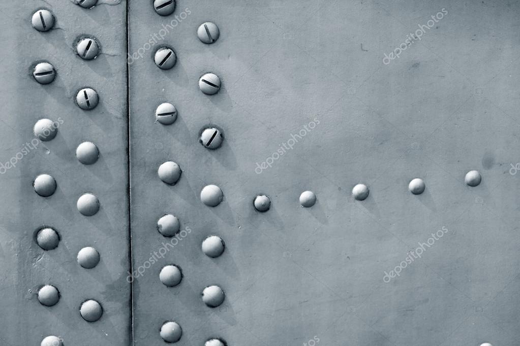 Riveted metal surface — Stock Photo © MADDRAT #51877979
