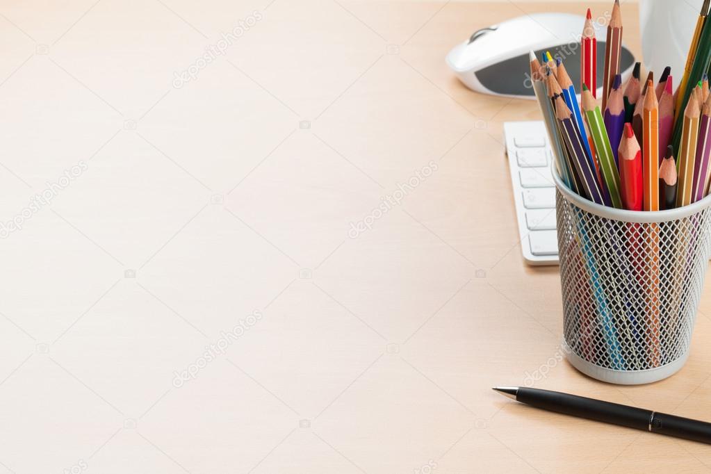 Office desk table with supplies Stock Photo by ©karandaev 100460268