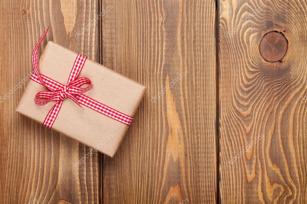 Gift box on table — Stock Photo © karandaev #66384671