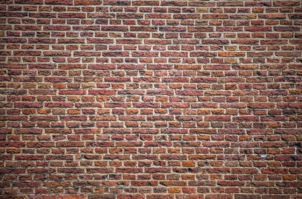 Het patroon van de stenen muur van het antieke baksteen. Foto ...