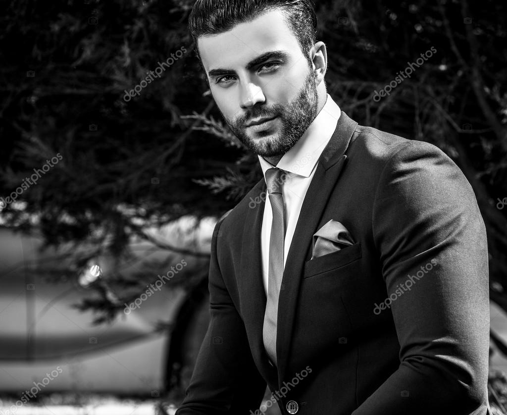 Elegant Handsome Man In Classical Costume Pose Outdoor Black White